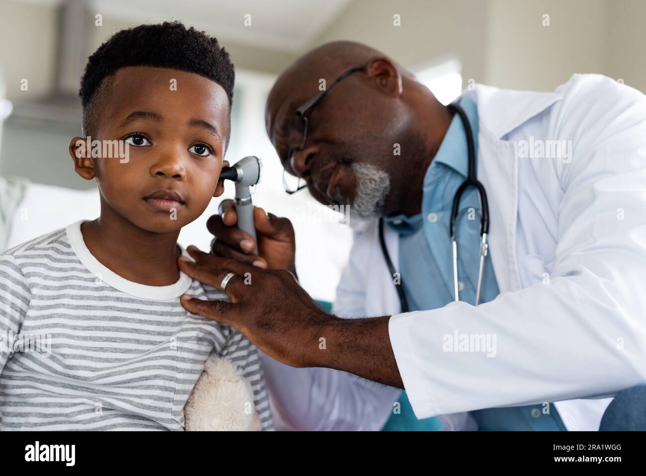 Doctor ear examination hi-res stock photography and images - Alamy