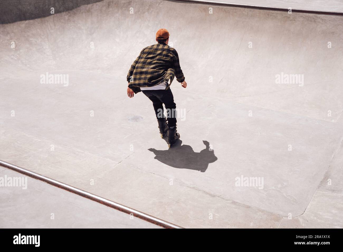 aggressive roller skater riding in skatepark Stock Photo - Alamy