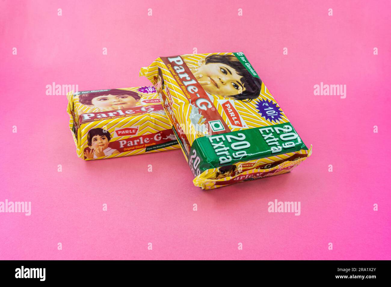 Two Pack Of Parle-G Biscuits Stack, Isolated On Pink Color Background ...
