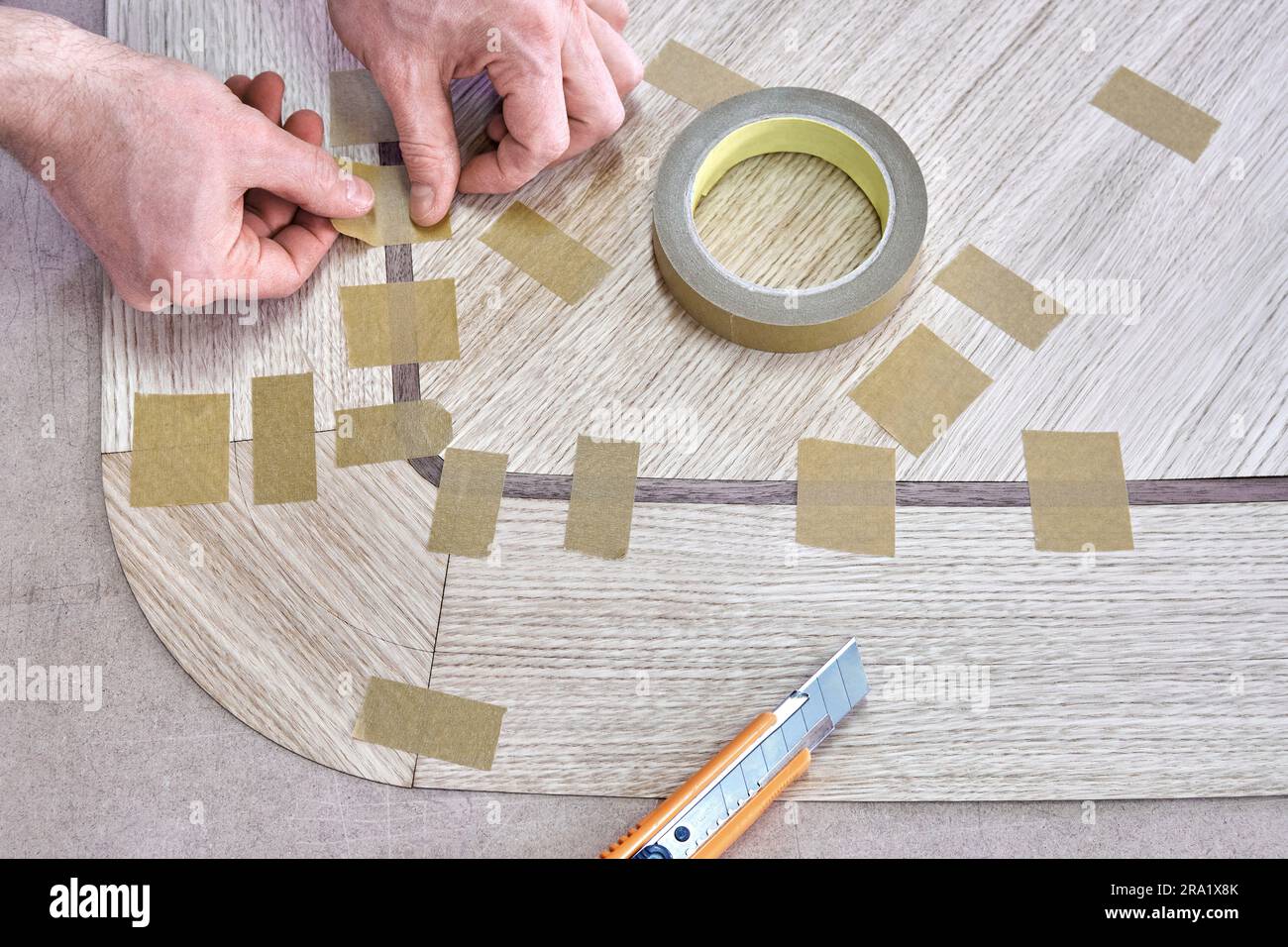 Carpenter joints veneer with tape for table top of dining table with ...