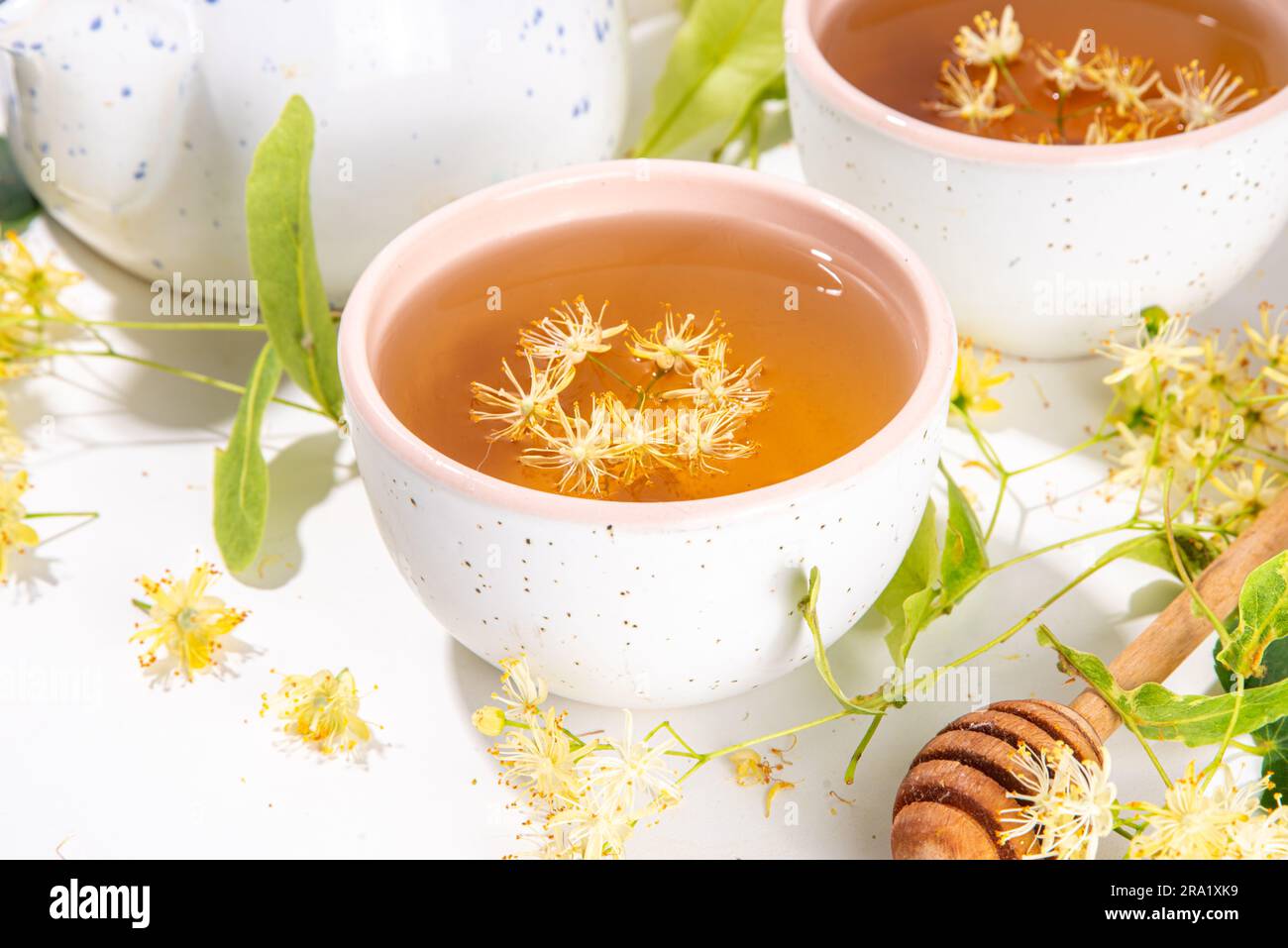 Organic herbal health drink. Linden plant flower green tea, in white ...