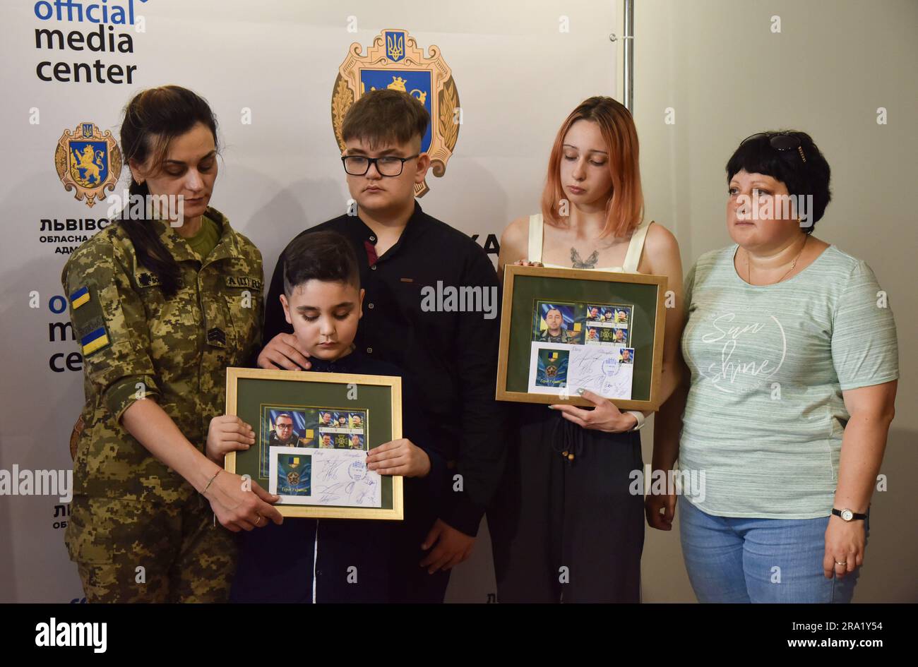 The families of border guards Roman Gah and Ihor Dashko, who were ...