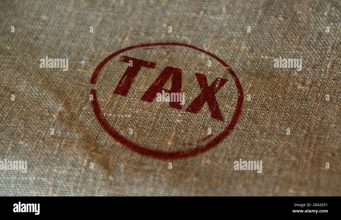Tax stamp printed on linen sack. Income taxation and payment concept ...