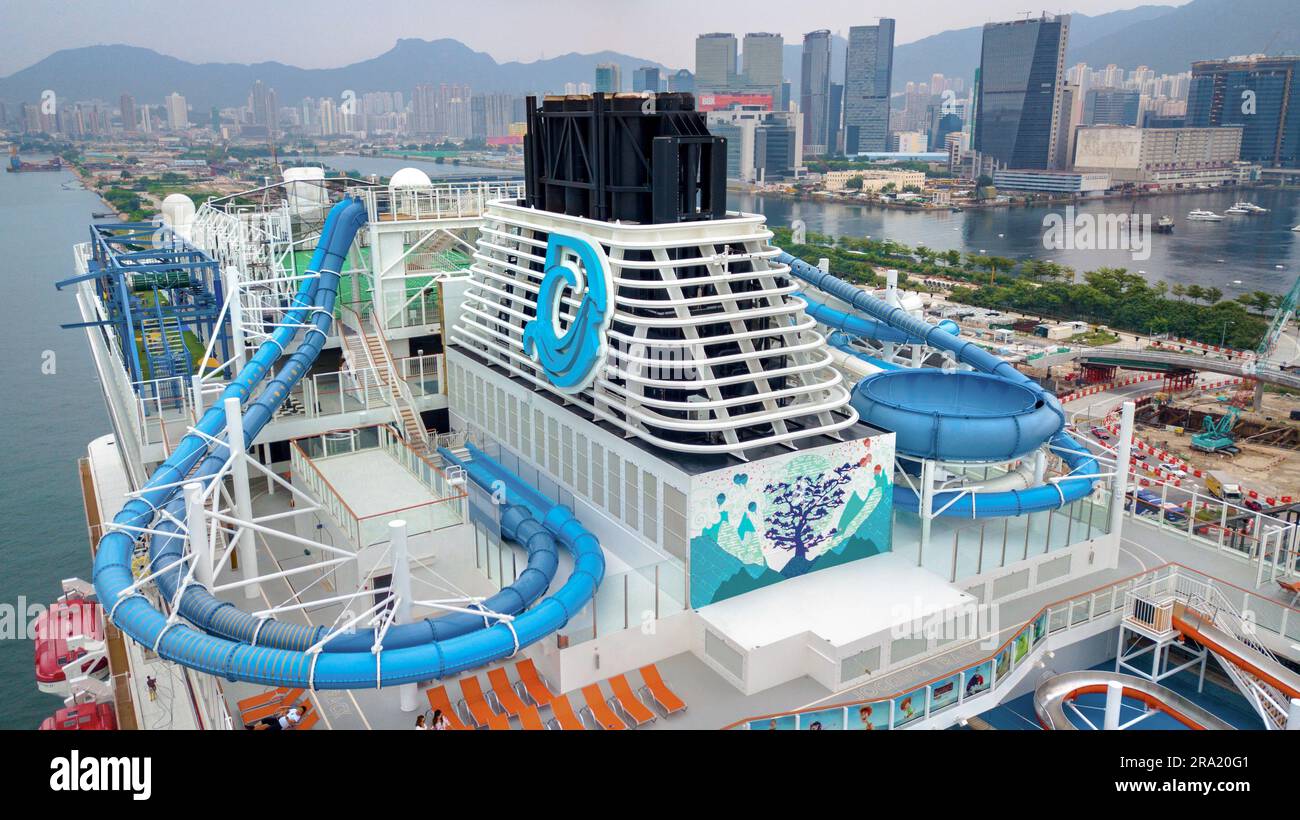 Aerial drone view of giant cruise ship World Dream, funnel, water ...