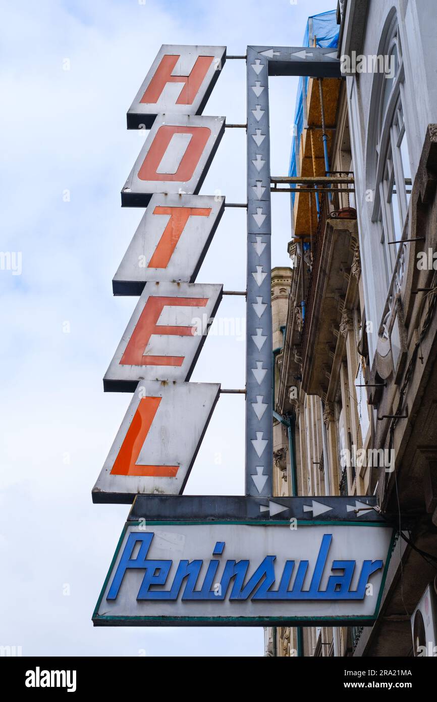 A colourful sign for the Hotel Peninsular in Porto, Portugal, 2023 ...