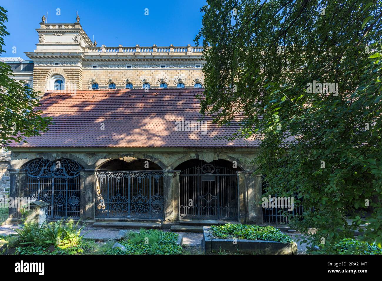 Crypt buildings with arched front at the cemetery wall are a special ...