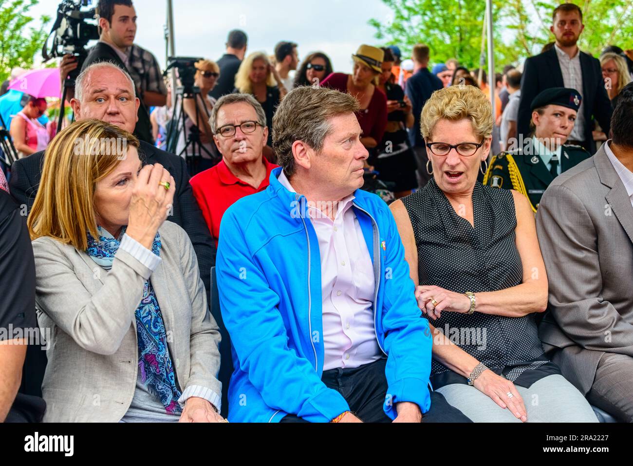 Barbara Hackett (left), John Tory (center), Kathleen Wynne (right ...