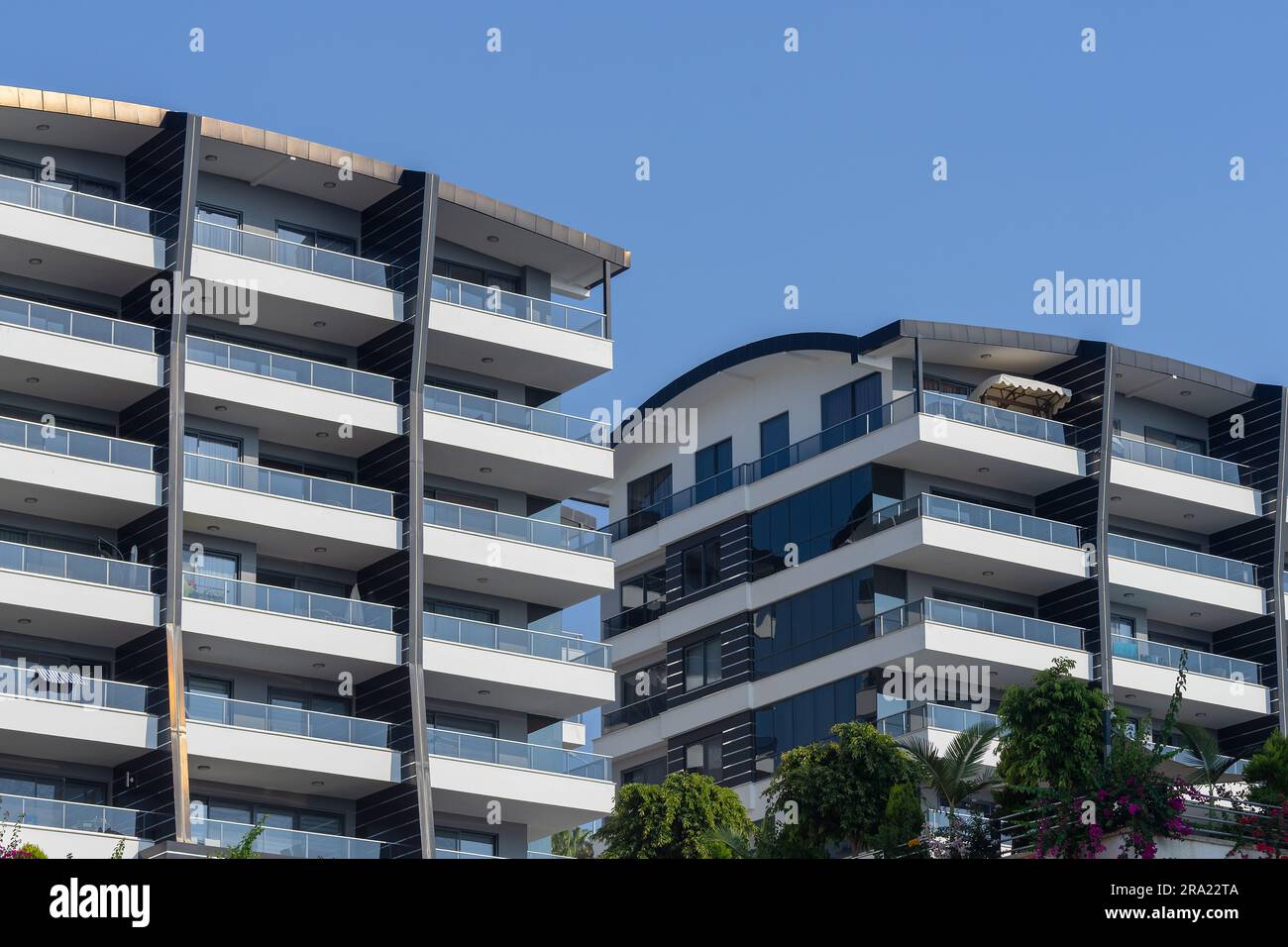 A modern residential complex consisting of several apartment buildings ...