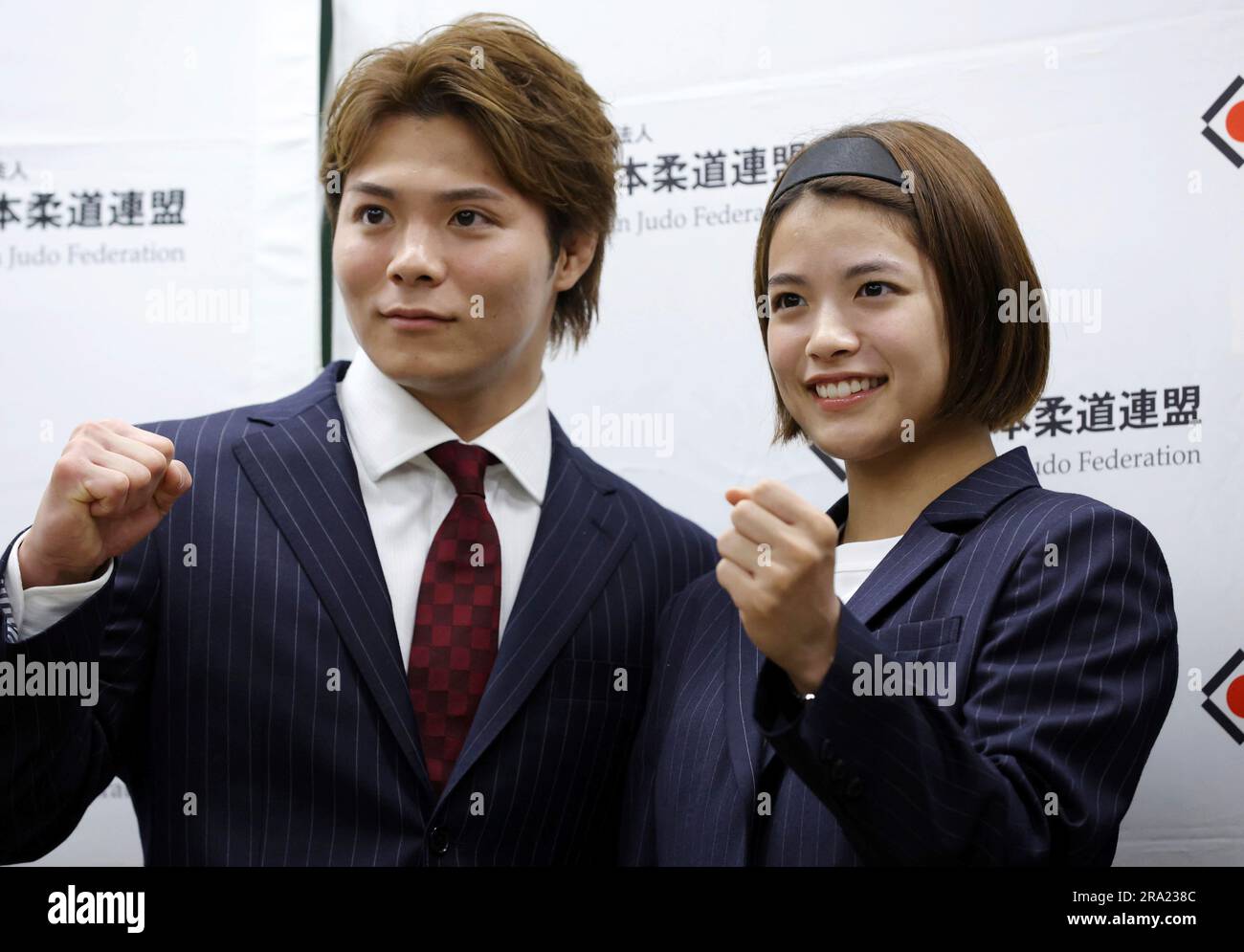 Olympic champion siblings Hifumi Abe (L) and Uta pose during a photo ...