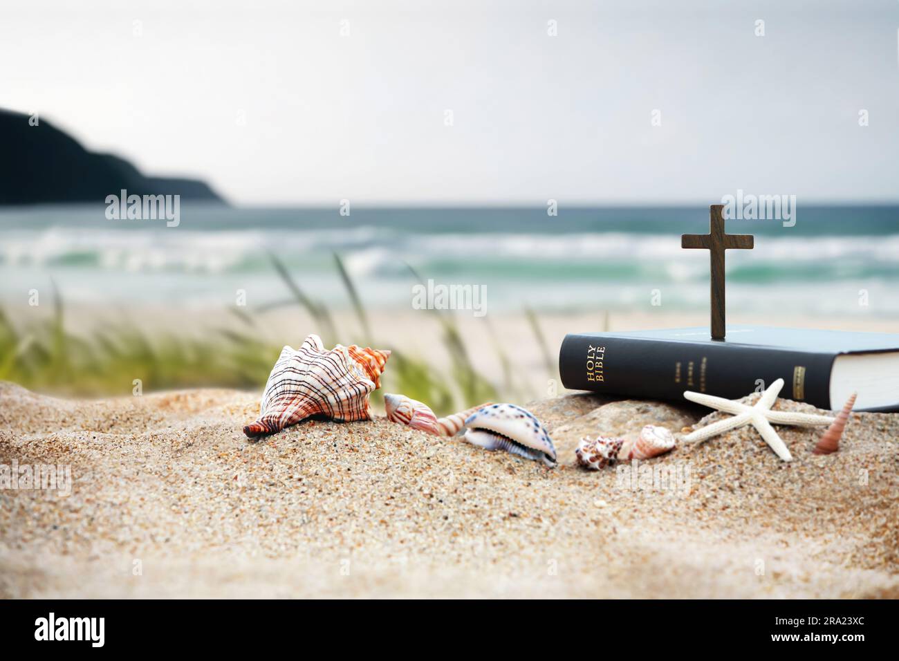 Church summer retreat concept with bible book, cross of Jesus Christ ...