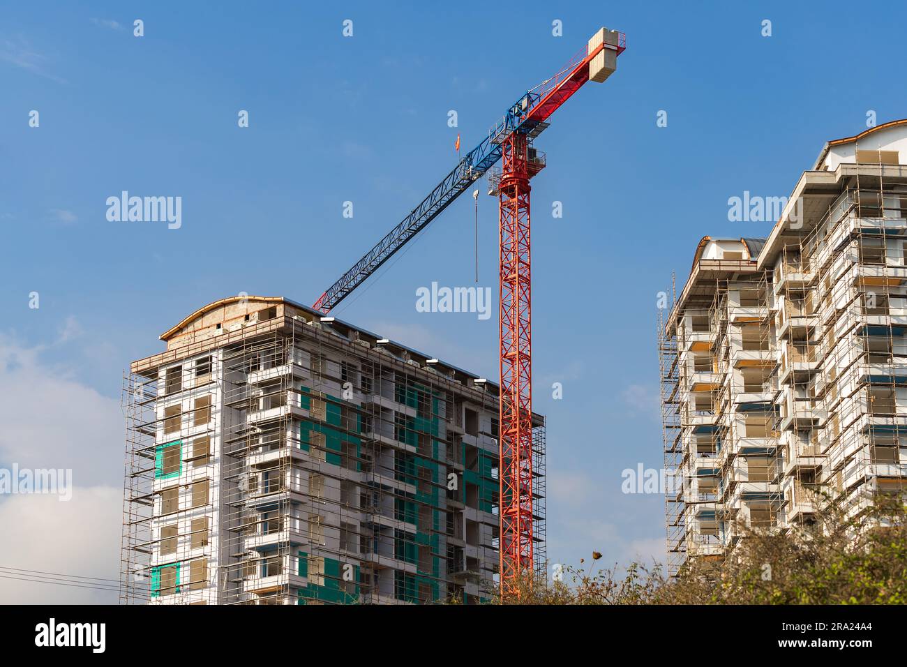 Modern apartment buildings under construction. New residential area ...