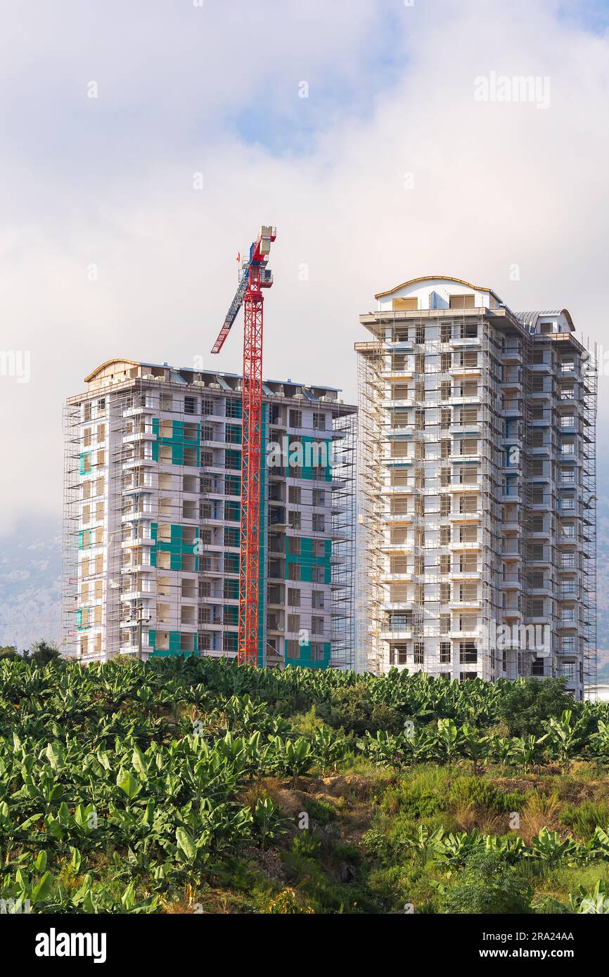 Modern apartment buildings under construction. New residential area ...