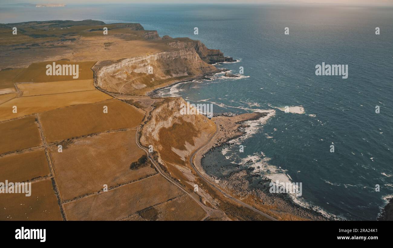 Sun farmlands at ocean cliff shore aerial. Nobody nature landscape ...