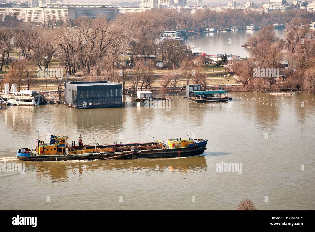 Cargo ship sails down river hi-res stock photography and images - Alamy