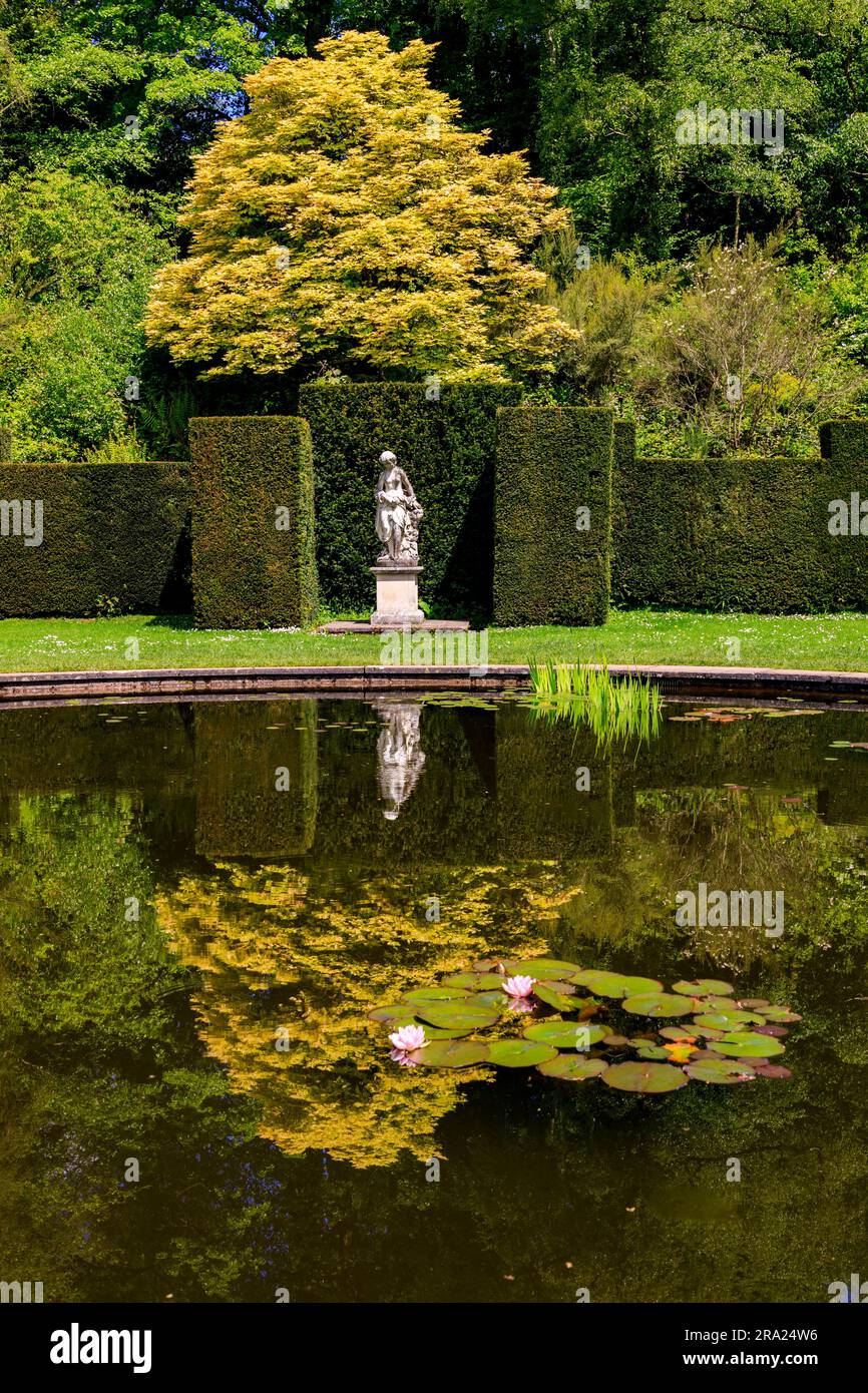 Reflections of the statue in the still waters of the circular Pool ...
