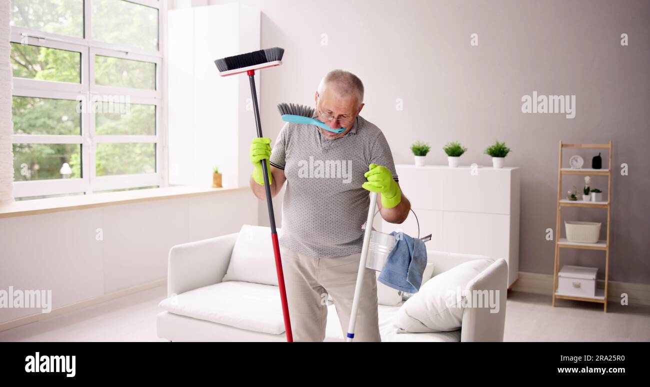 Funny Confused Cleaner Man In Various With Various Cleaning Equipment ...