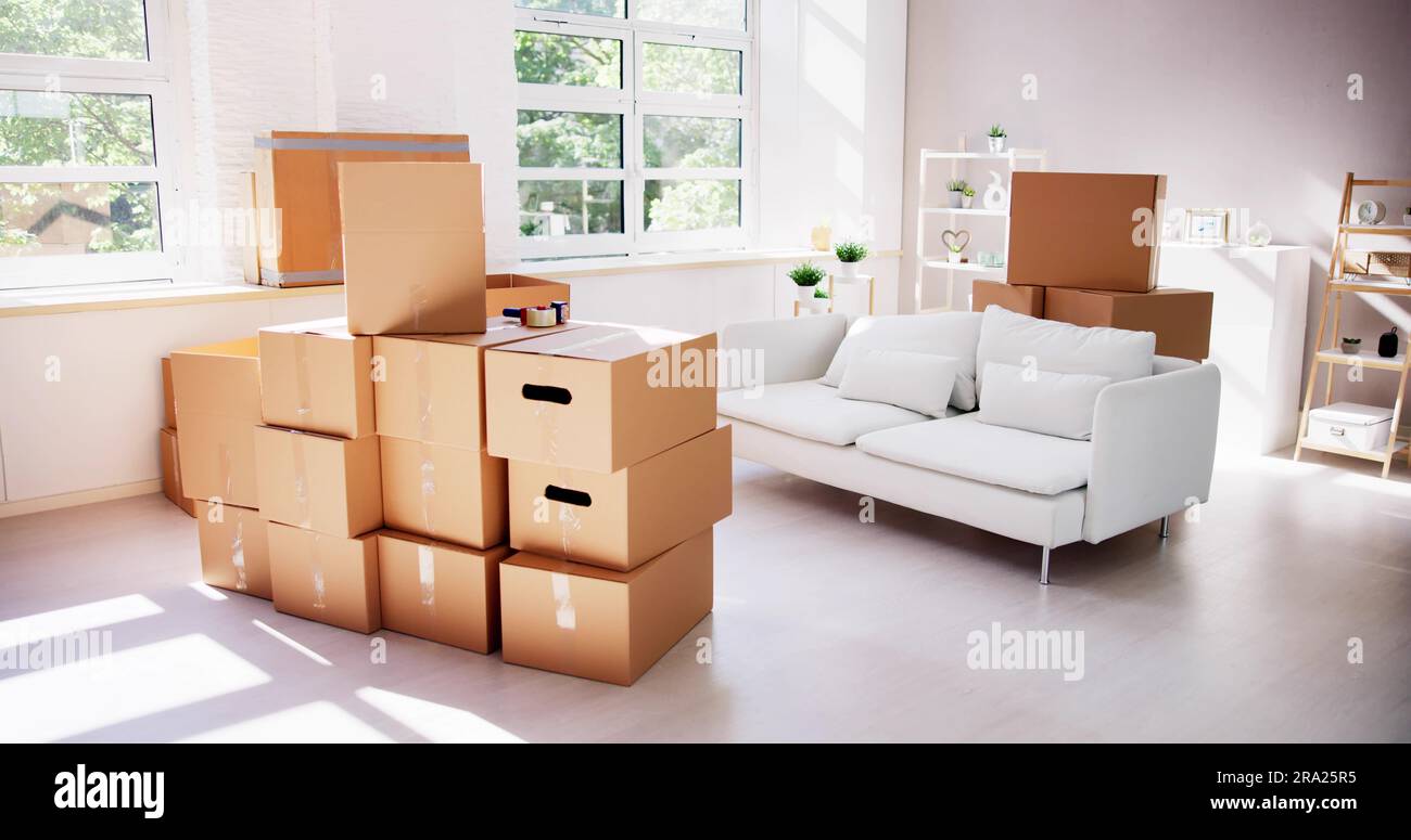 Residential Living Room Relocation. Moving Furniture And Delivery Boxes ...