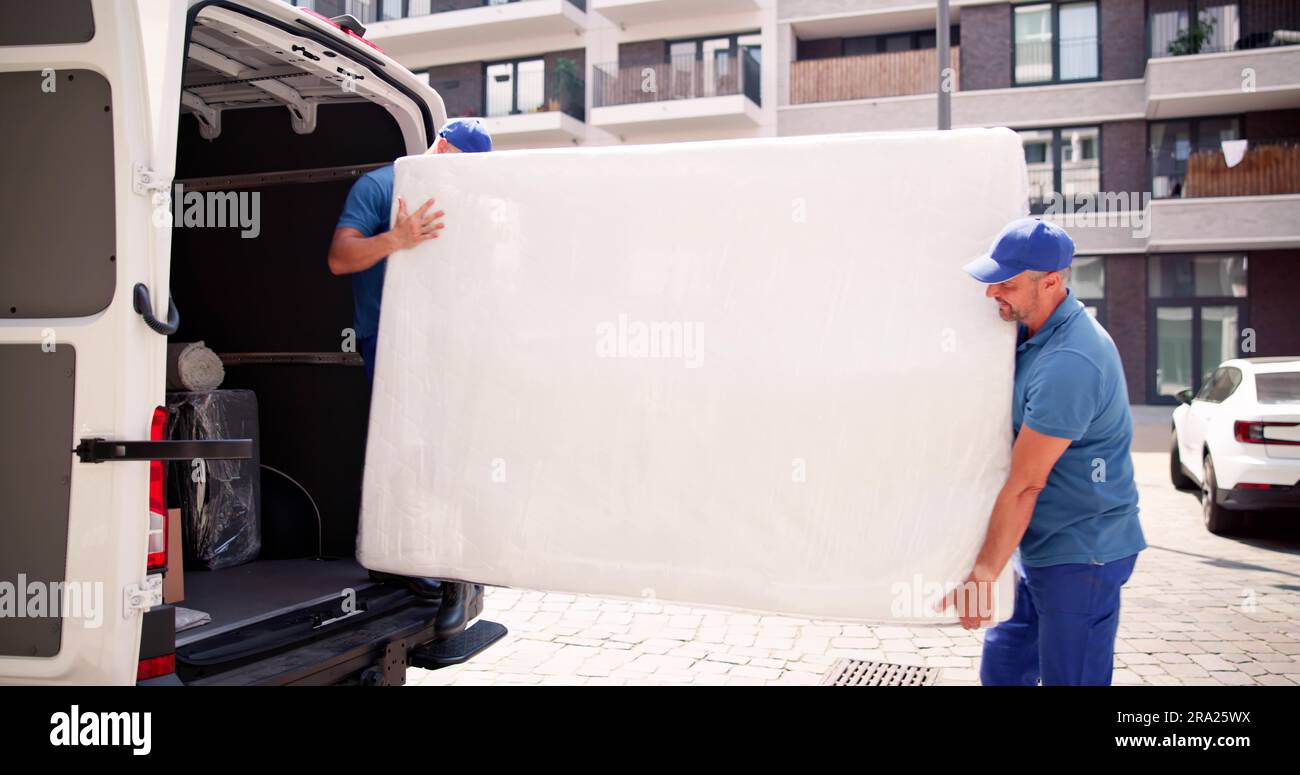 Mattress Delivery Truck. Movers Transporting And Shipping Stock Photo ...