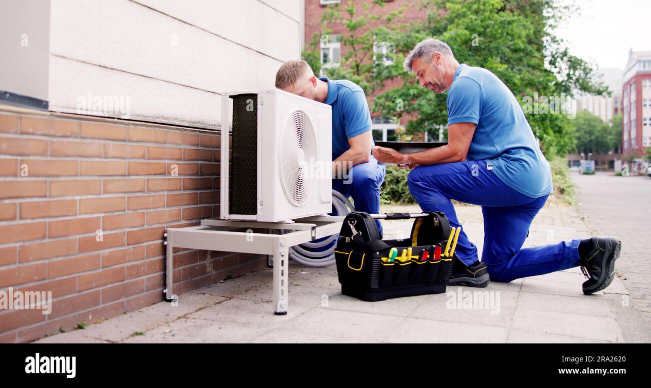 Air Conditioner Install. Commercial HVAC Maintenance Service Stock ...