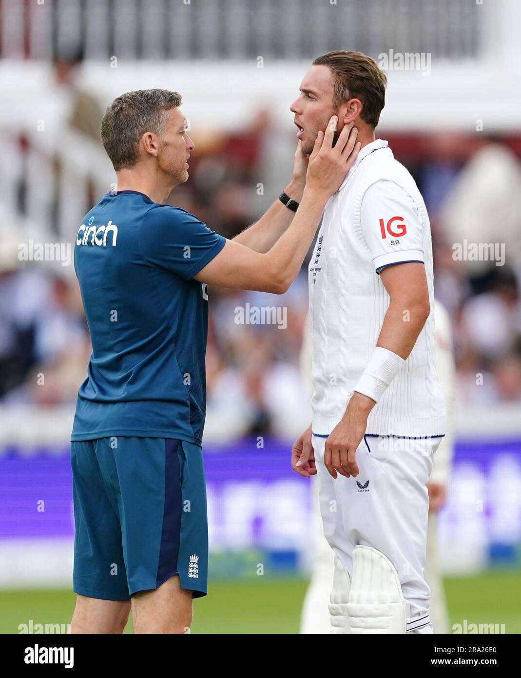 A doctor attends to England's Stuart Broad after he is hit on the ...