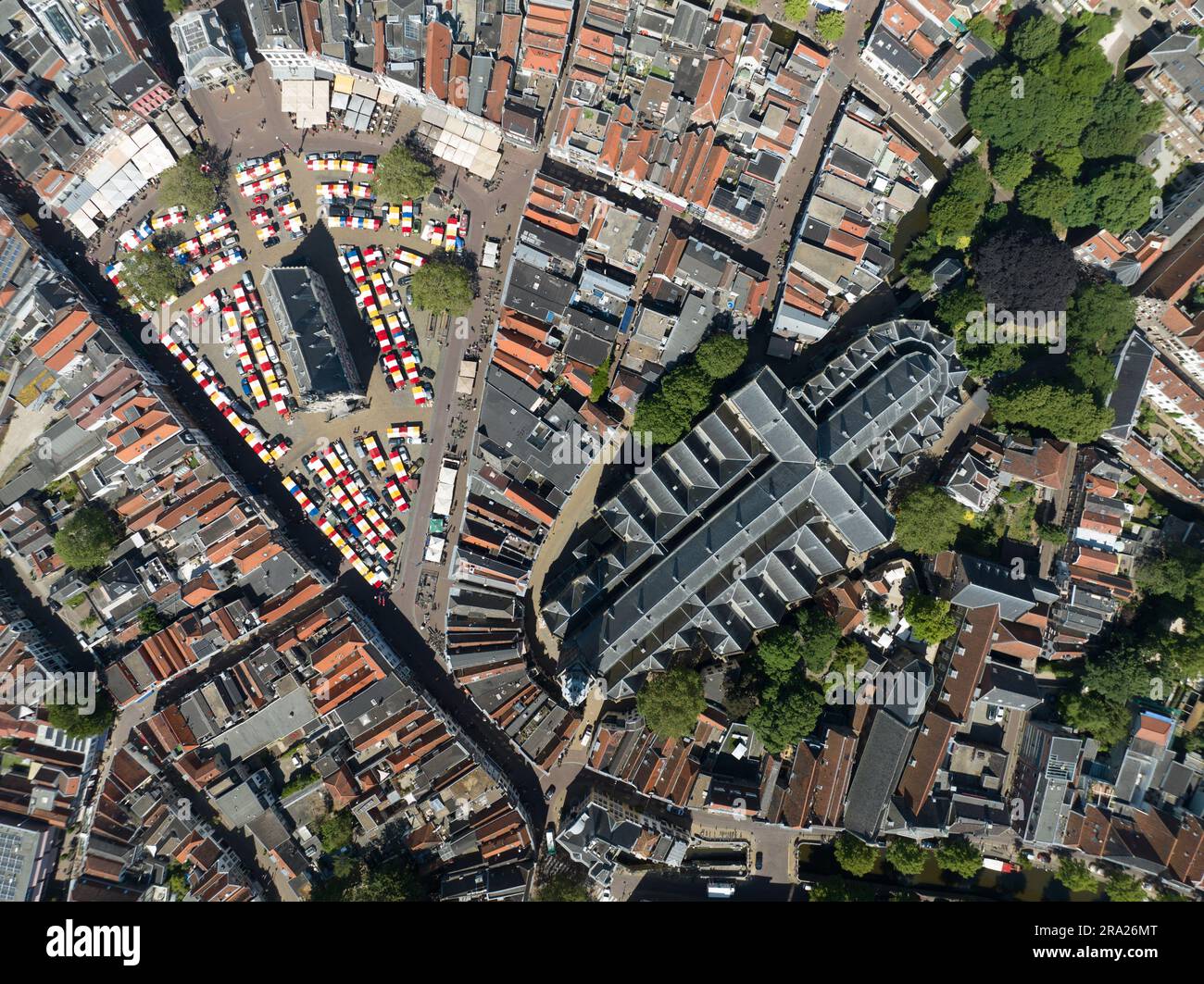 Gouda town hall, church and city center. With market taking place Stock ...