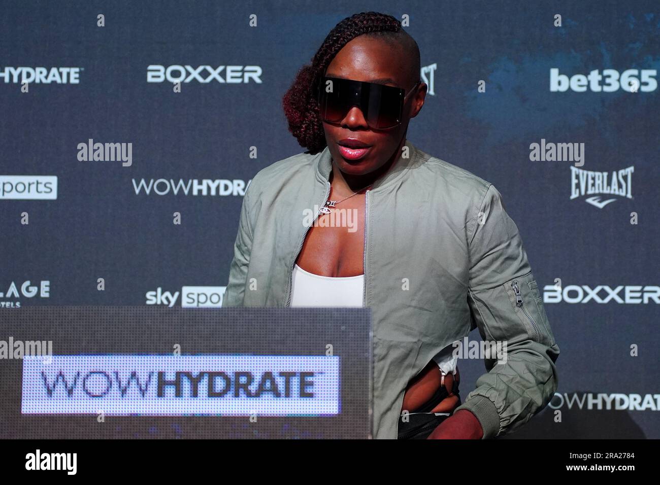 Boxer Franchon Crews-Dezurn tests the weighing machine before a weigh ...