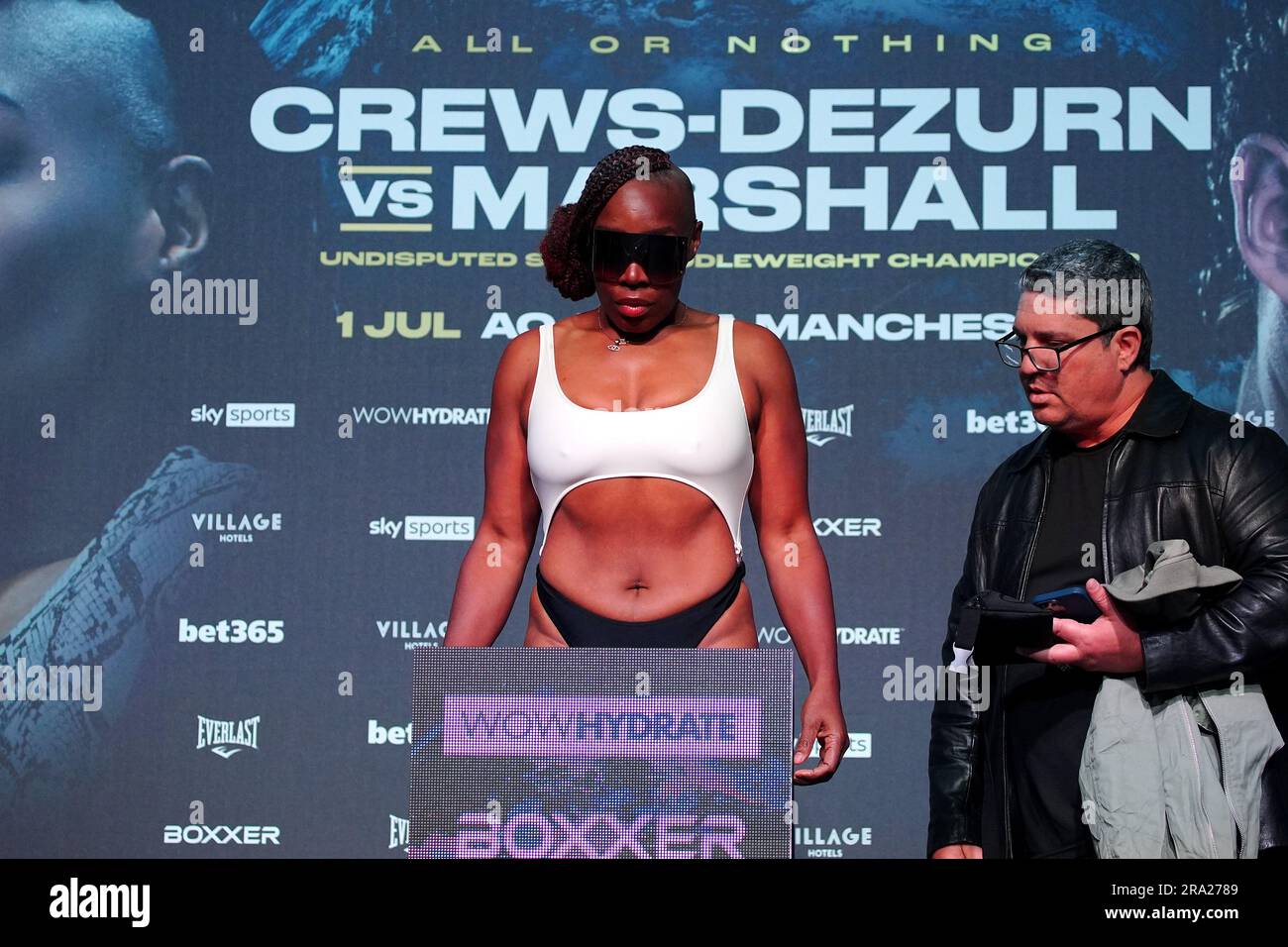 Boxer Franchon Crews-Dezurn tests the weighing machine before a weigh ...