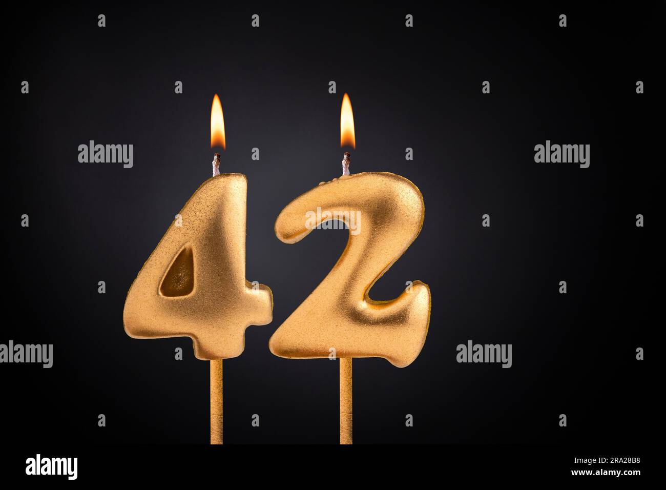 Birthday candle number 42 - Birthday celebration on black background ...