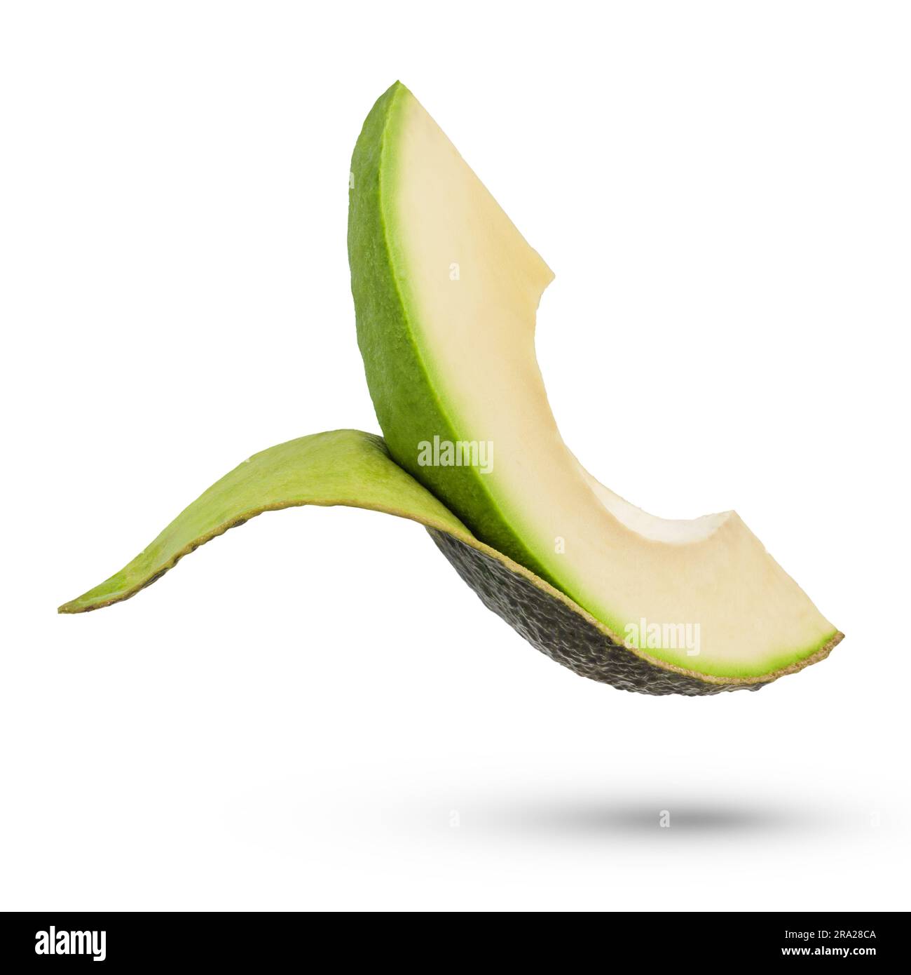 A slice of fresh avocado on a white isolated background. A slice of ...