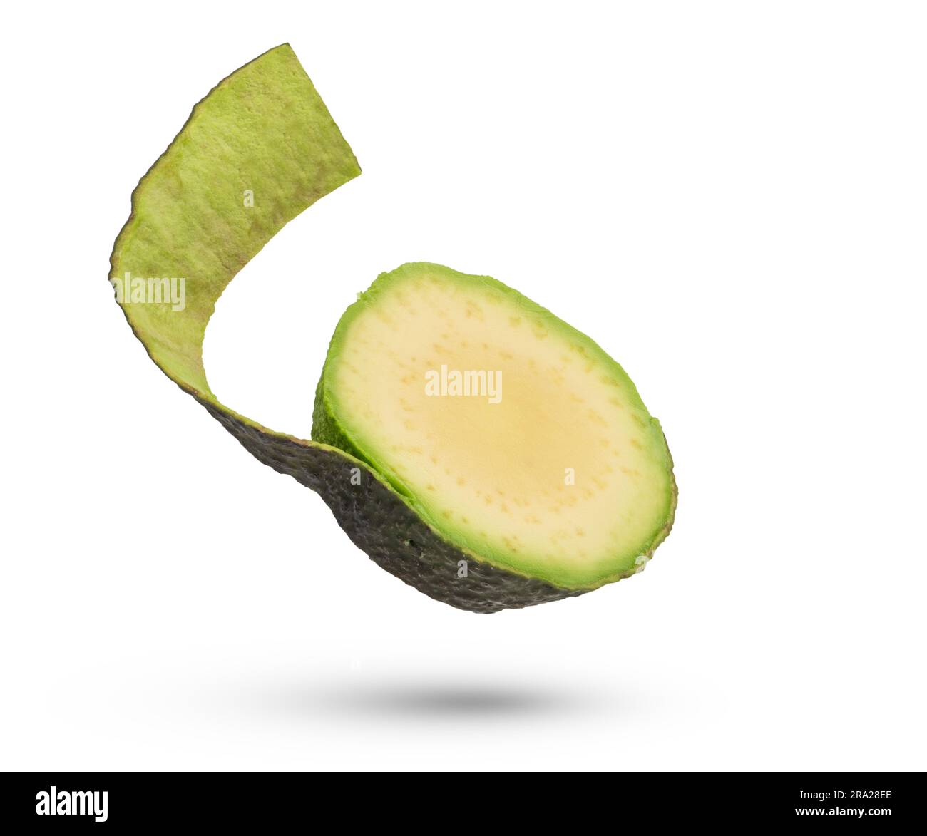 A slice of fresh avocado on a white isolated background. A slice of ...