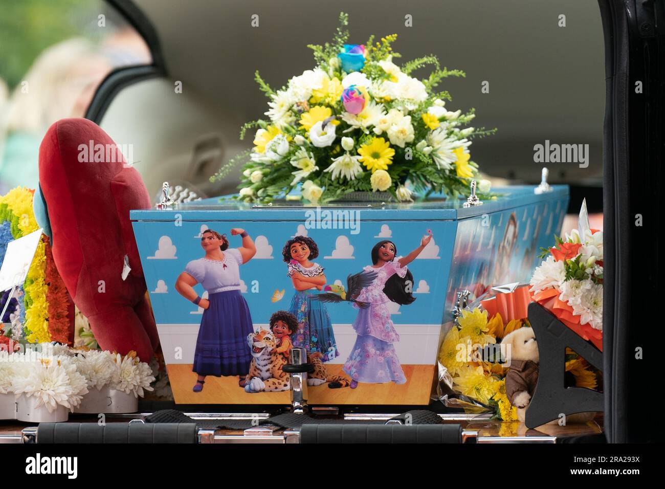 The coffin of Noah Cox-Lee, decorated with Disney cartoons, arrives at ...