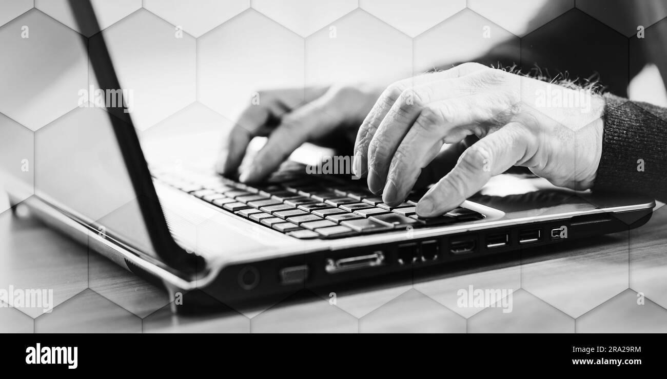 Typing on notebook computer keyboard Black and White Stock Photos ...