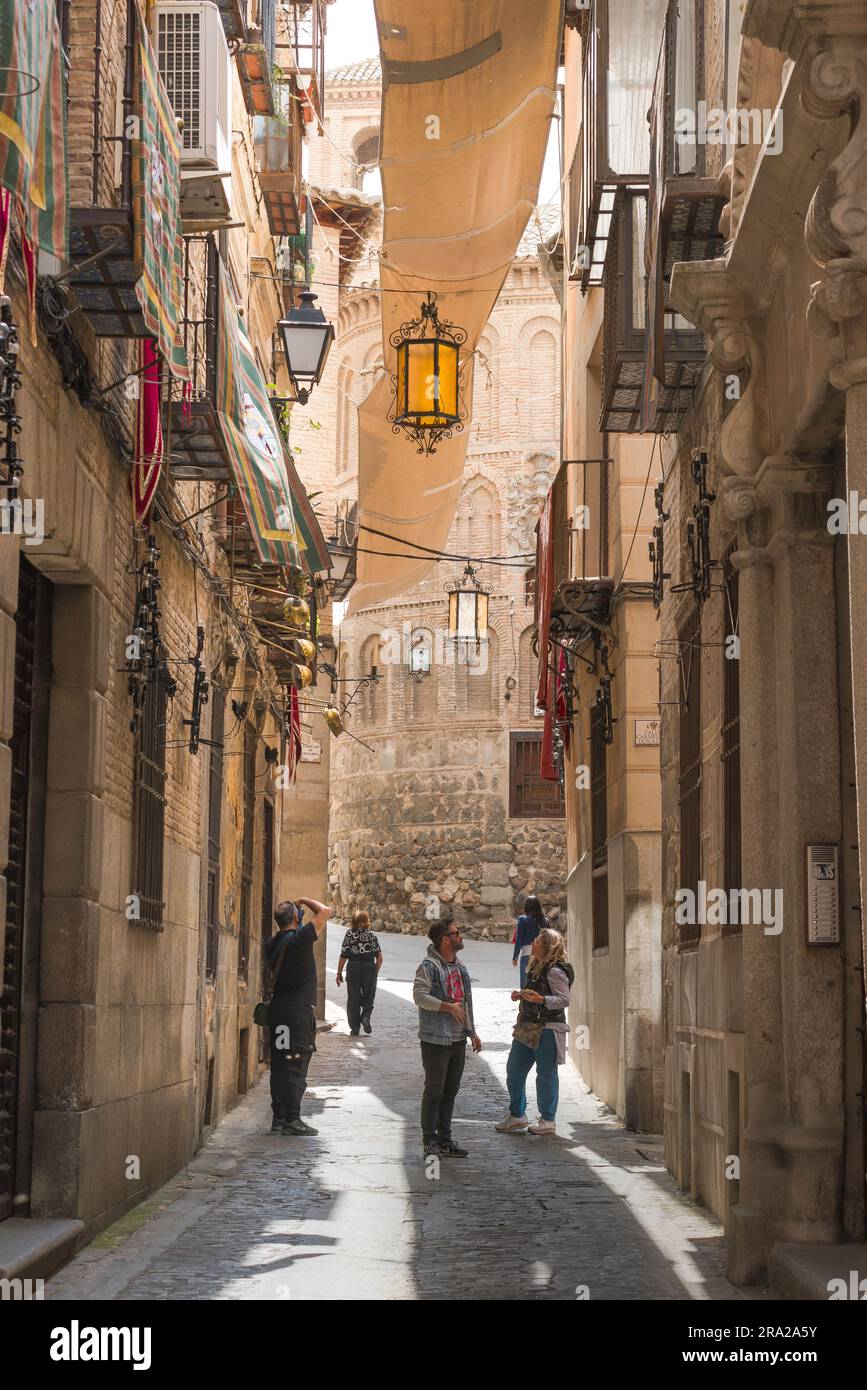 Historic Spain, view in summer of people exploring the narrow medieval ...