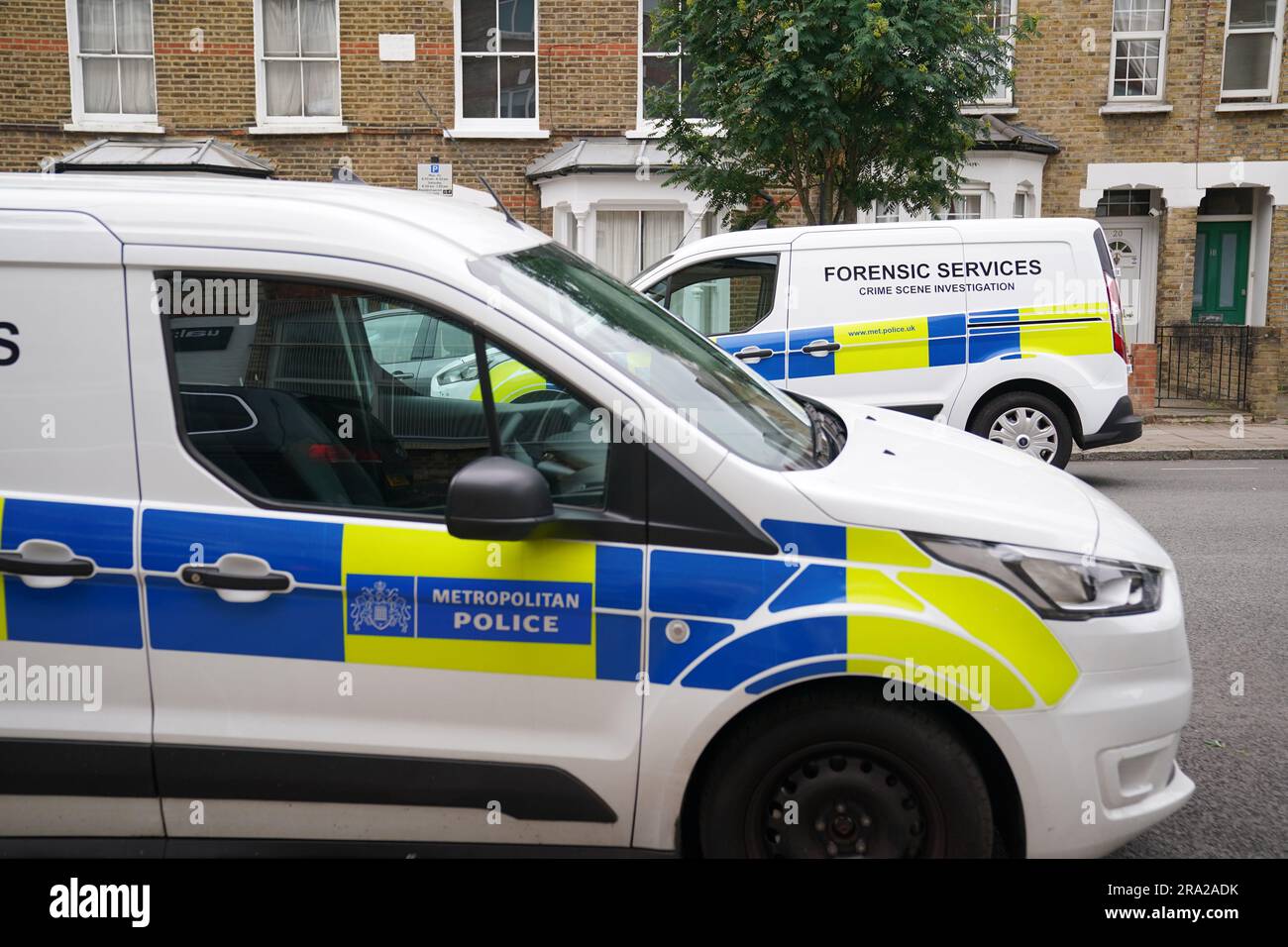 Forensic officers in Elthorne Road, Islington, London after a man and a ...