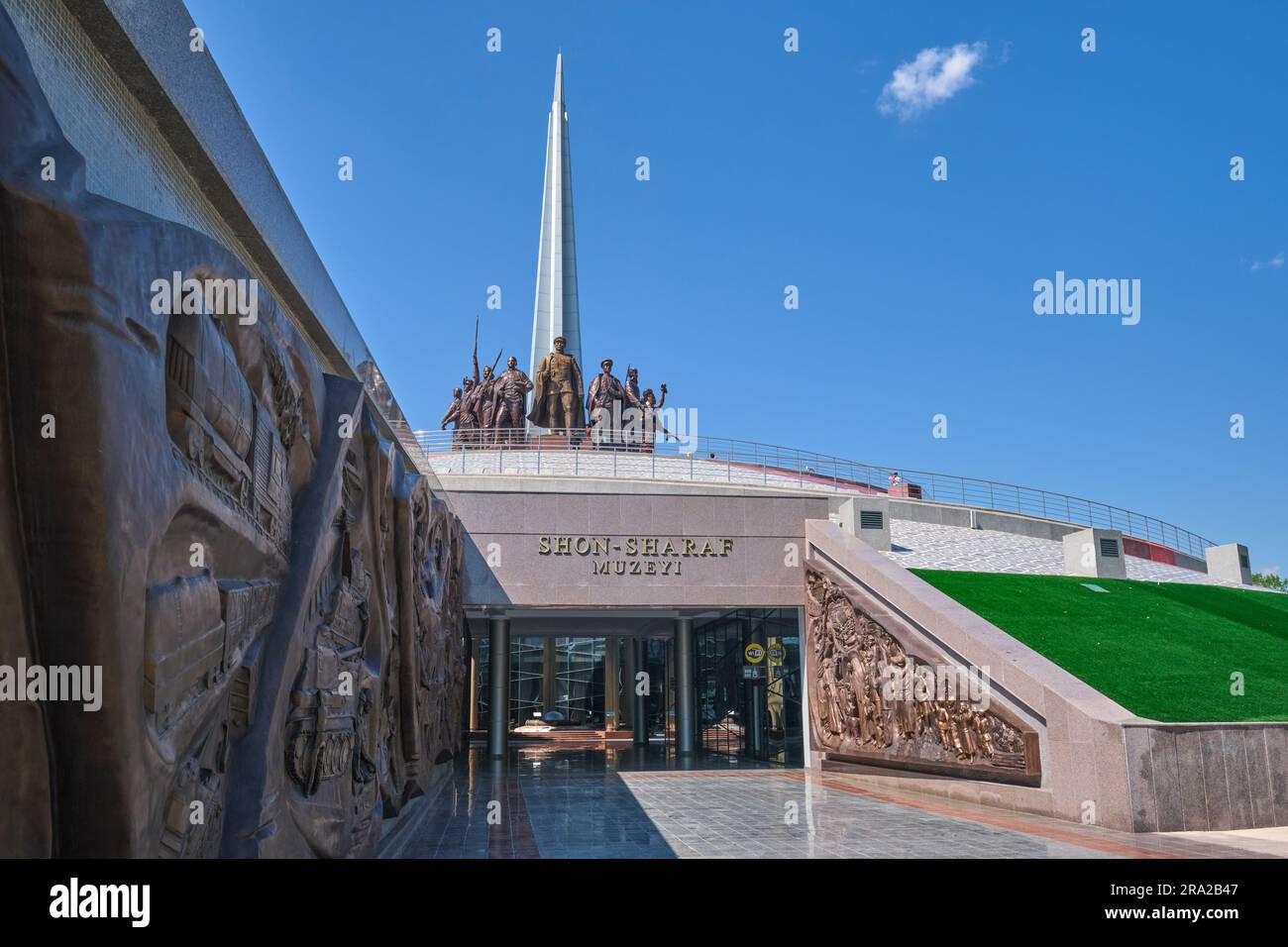 The front entrance with elaborate bronze frieze. At the Shon Sharaf Great Patriotic War, WWII ...