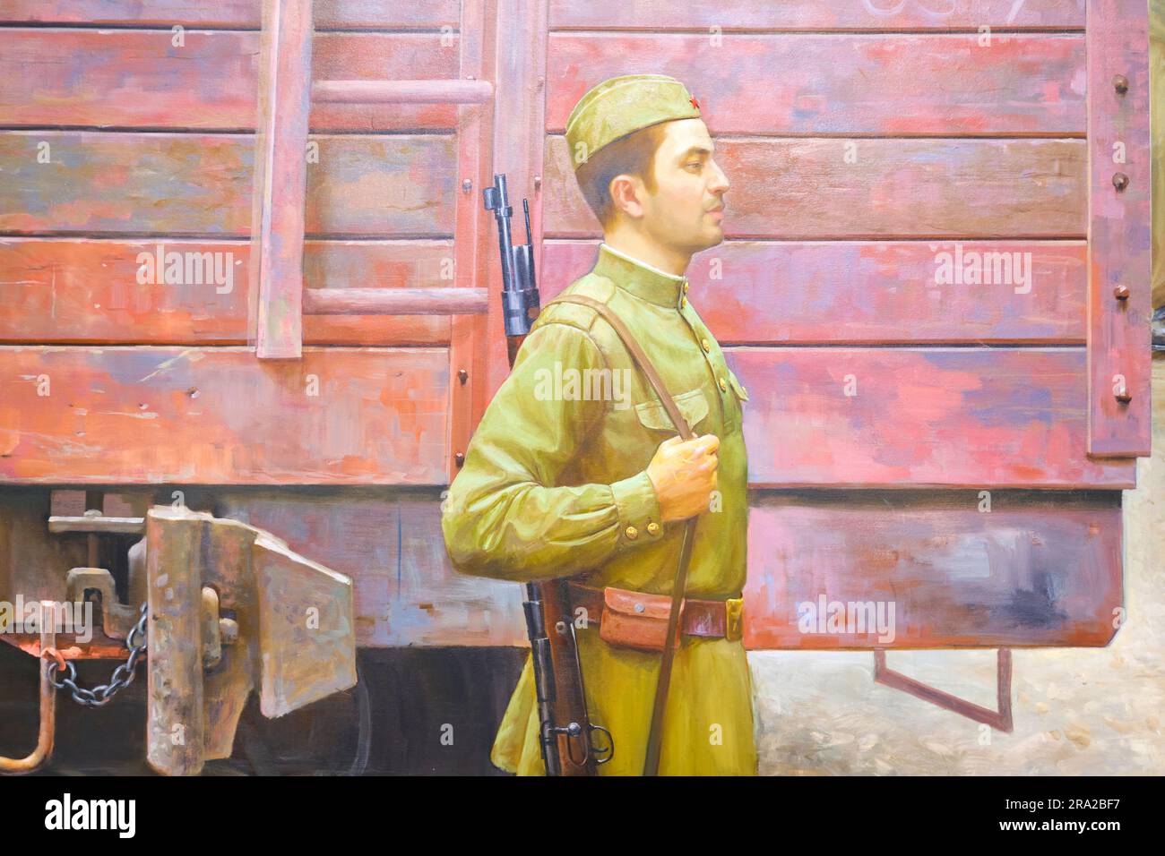 Profile of a soldier with a rifle. Part of the large mural of the train ...