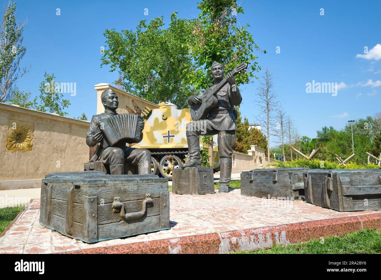 A sculpture of musician soldiers playing guitar and accordian ...