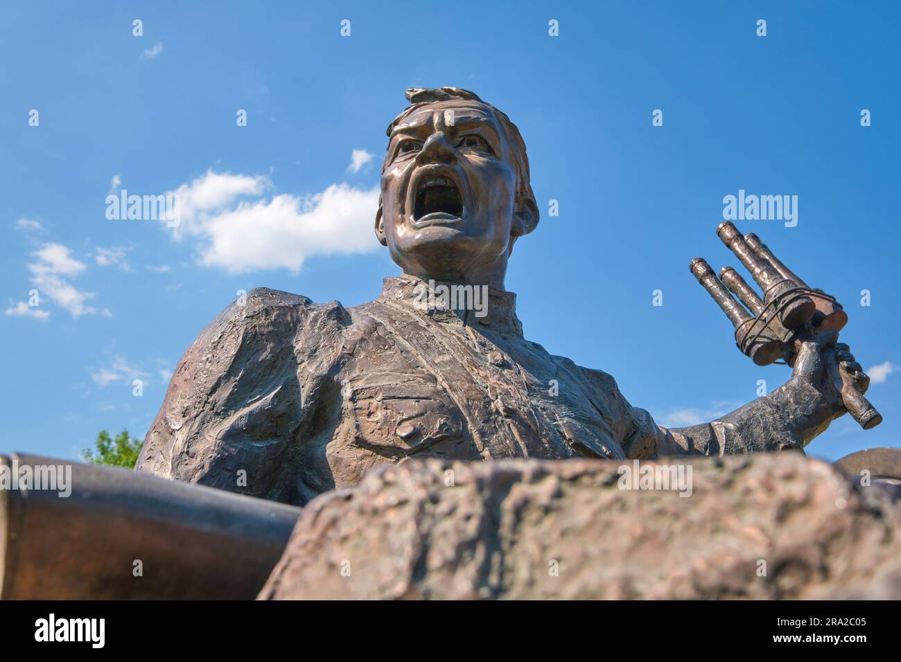A sculpture of a yelling Red Army soldier, about to throw a hand ...