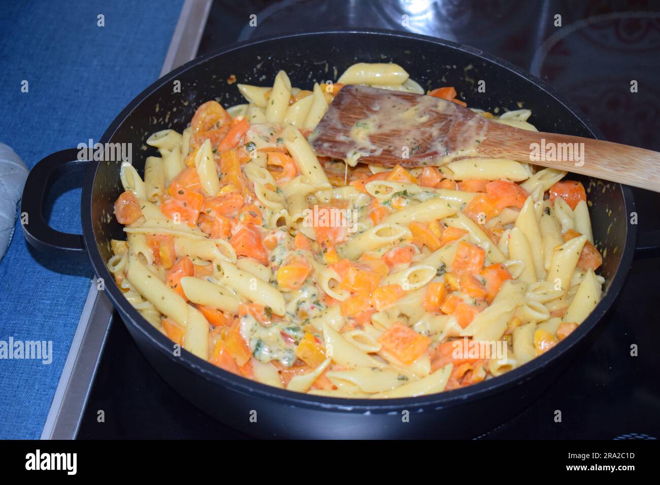 orange paprika and cheese sauce pasta Stock Photo - Alamy