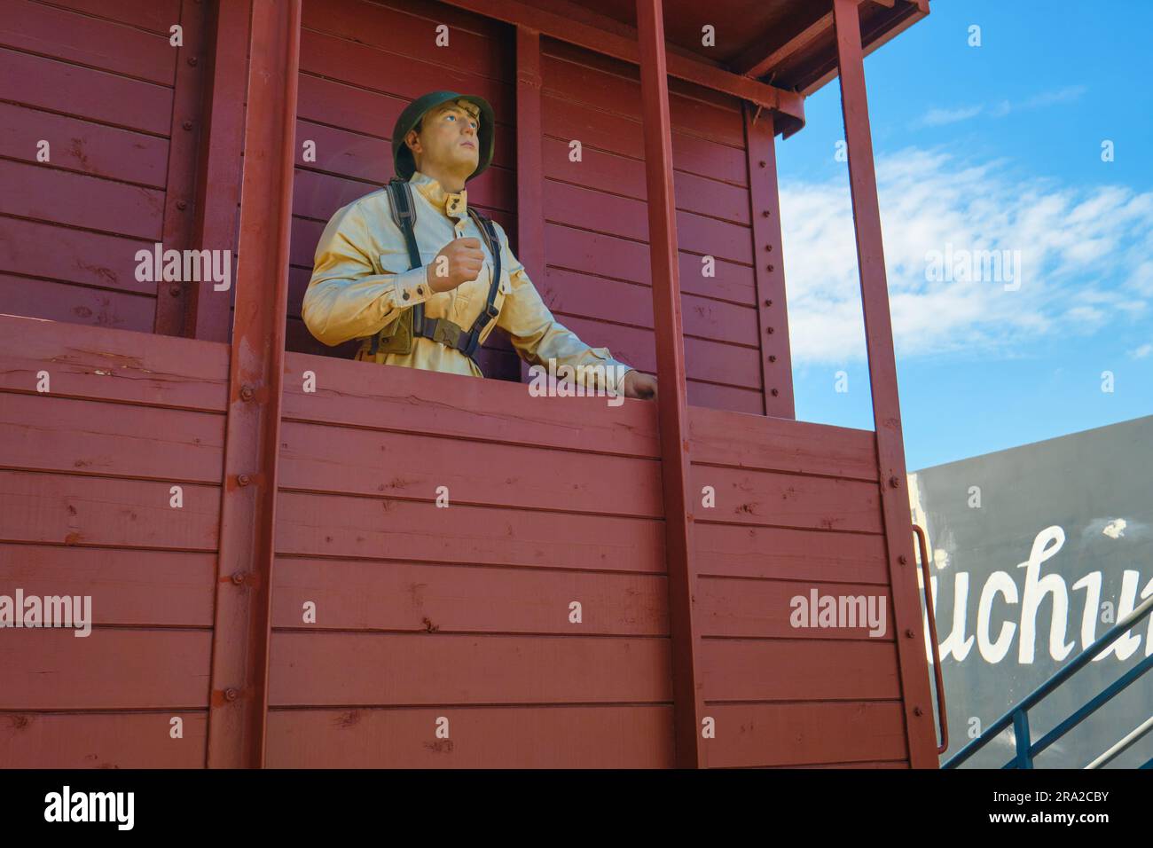 A recreation of a Red Army soldier standing guard on the back of a red ...