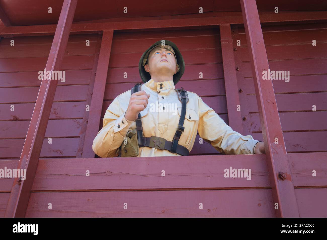 A recreation of a Red Army soldier standing guard on the back of a red ...