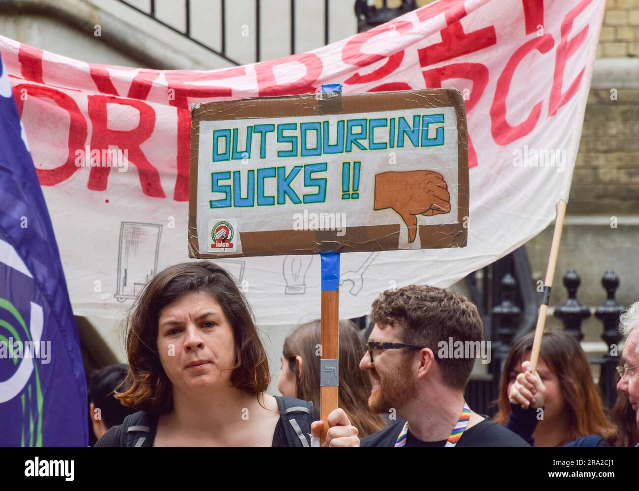 London, England, UK. 30th June, 2023. A protester holds a placard ...