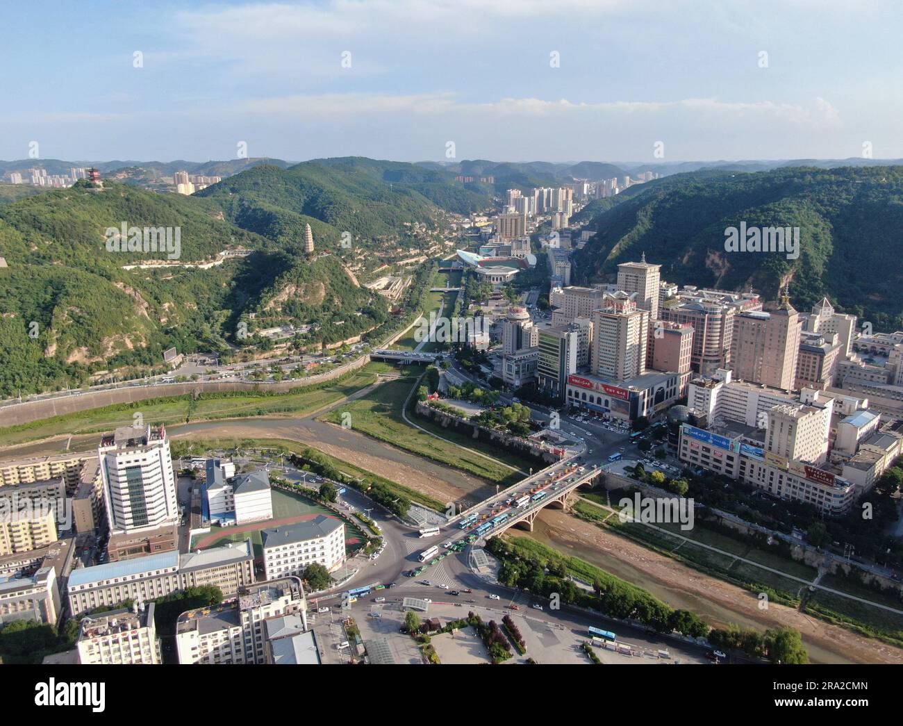 Yan'an. 26th June, 2023. This aerial photo taken on June 26, 2023 shows ...