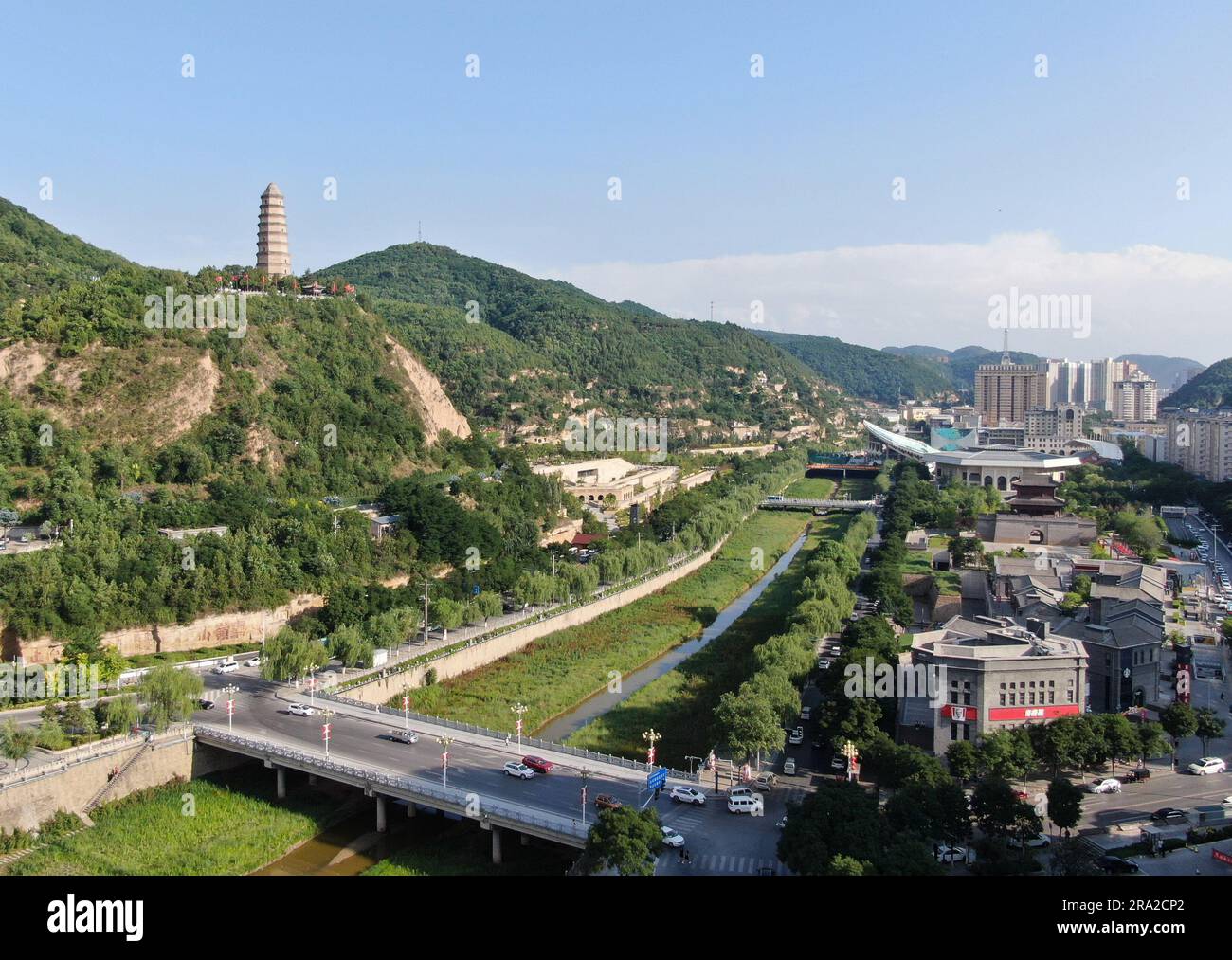 Yan'an. 26th June, 2023. This aerial photo taken on June 26, 2023 shows ...