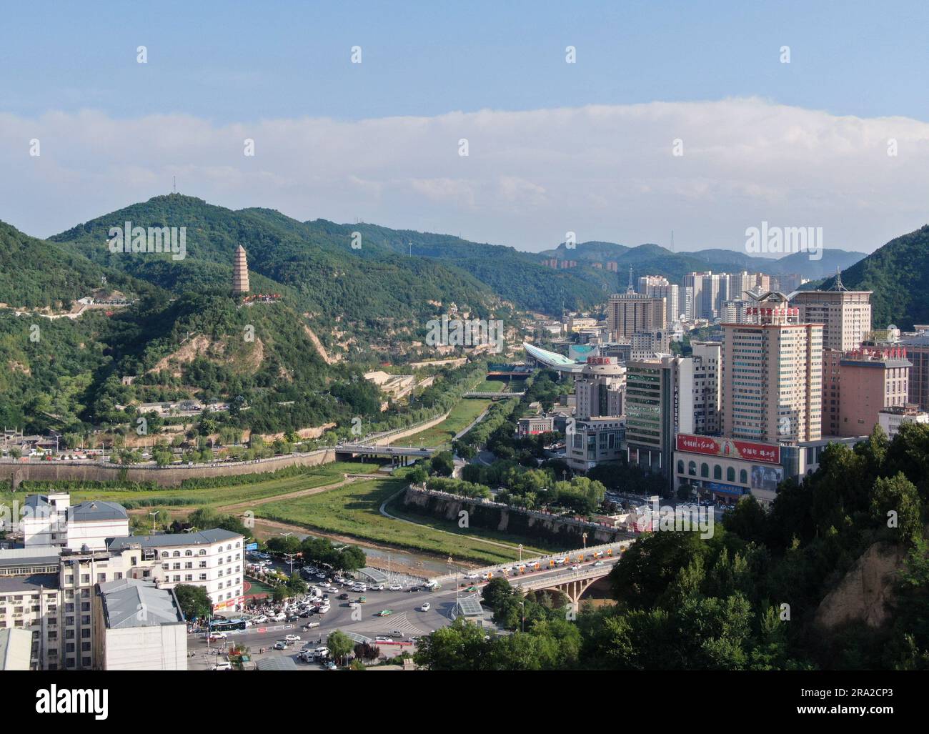 Yan'an. 26th June, 2023. This aerial photo taken on June 26, 2023 shows ...