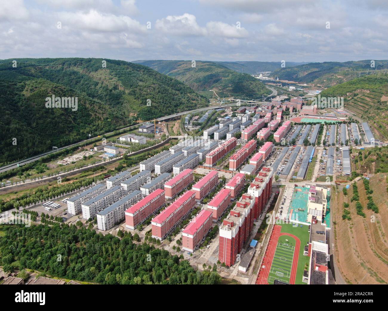 Yan'an. 28th June, 2023. This aerial photo taken on June 28, 2023 shows ...