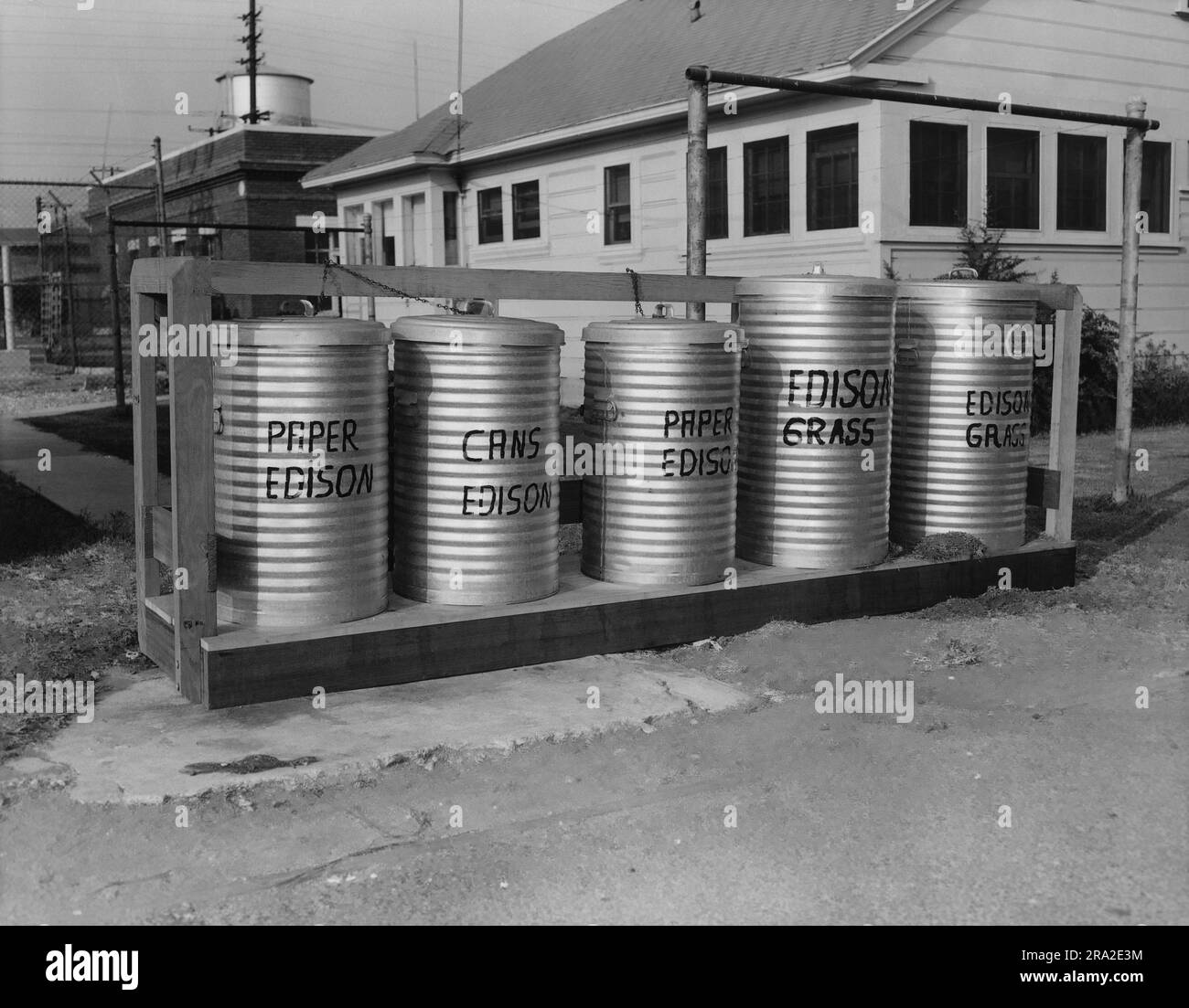 Tall aluminum recycling containers sitting in a rack in a residential ...