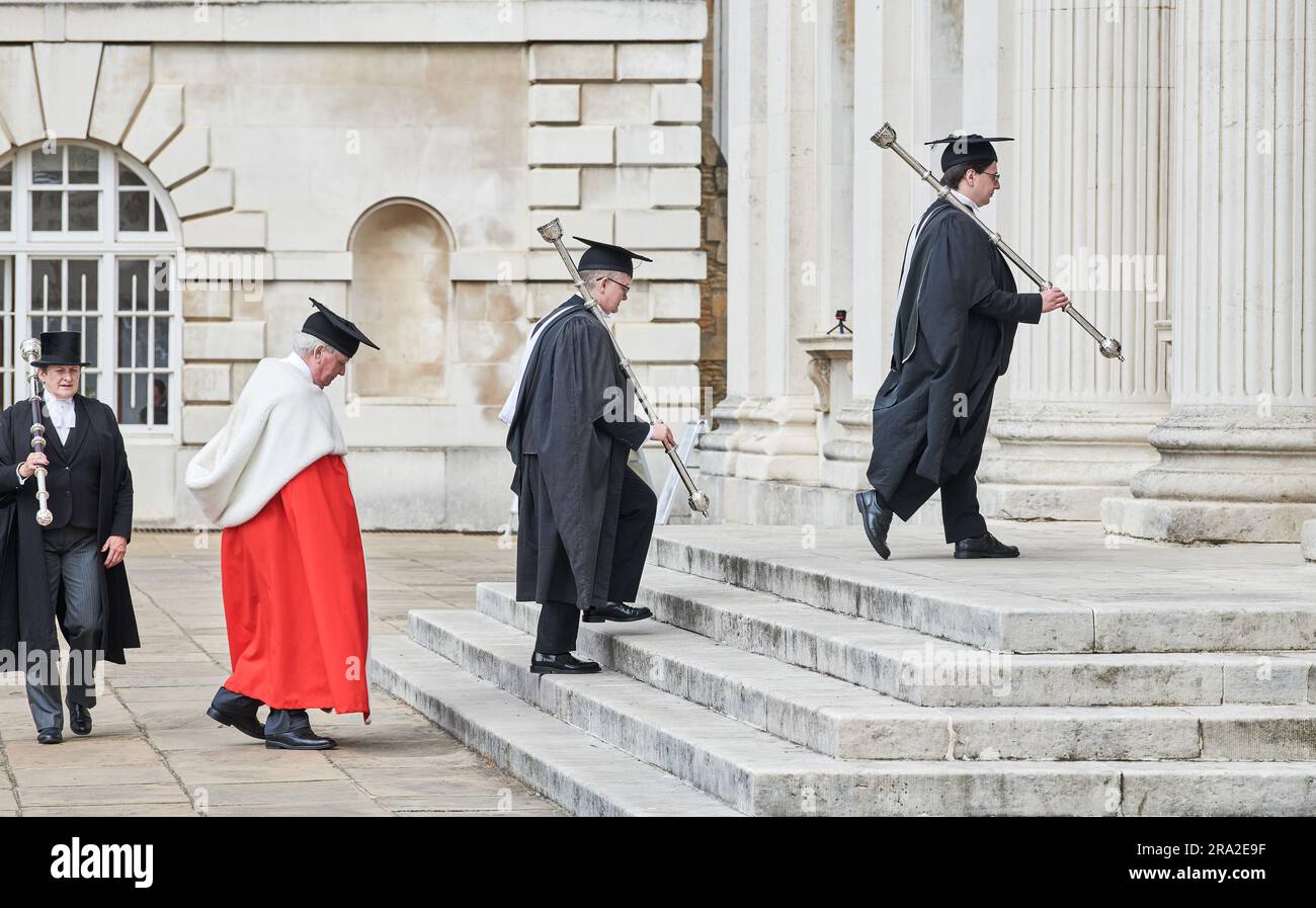 Esquire Bedells (mace bearers) in academic dress process with Sir ...