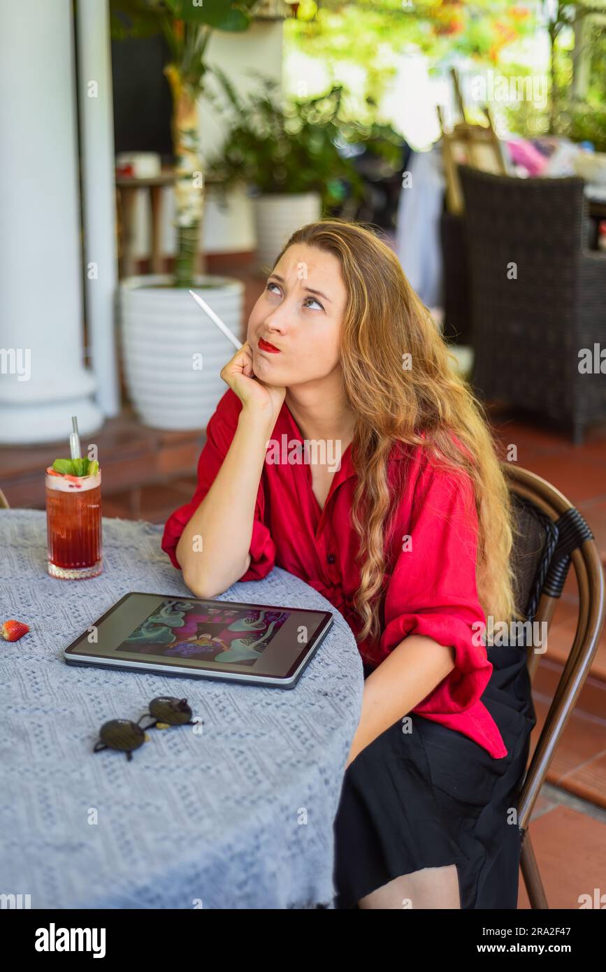 Beautiful blonde woman artist and illustrator made an idea about a ...