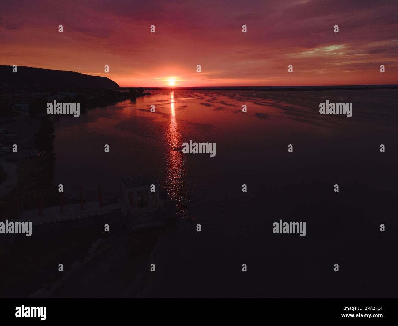 sunset above lefkada town Stock Photo - Alamy